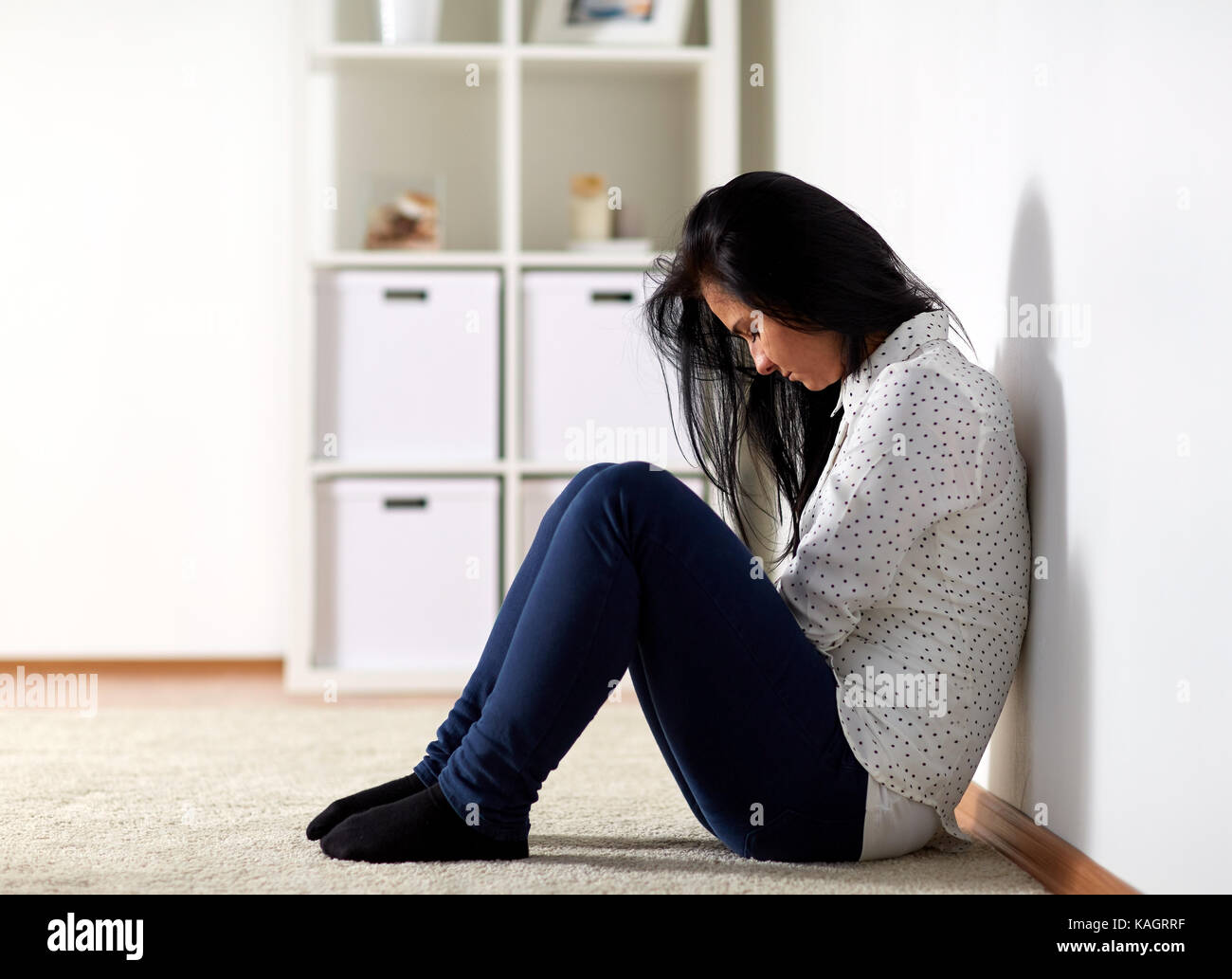 Abused woman crying home hi-res stock photography and images - Alamy