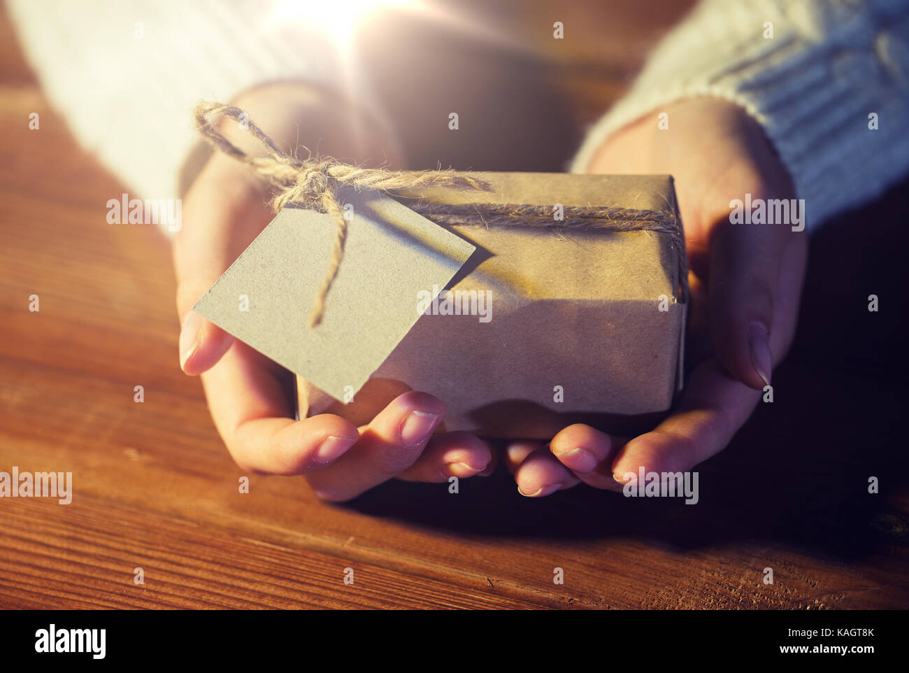 close up of woman with christmas gift or parcel Stock Photo - Alamy