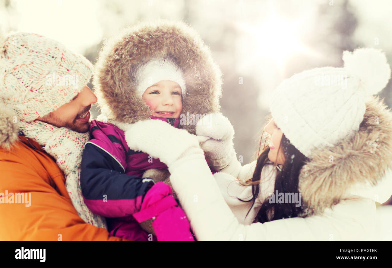 happy family with child in winter clothes outdoors Stock Photo - Alamy