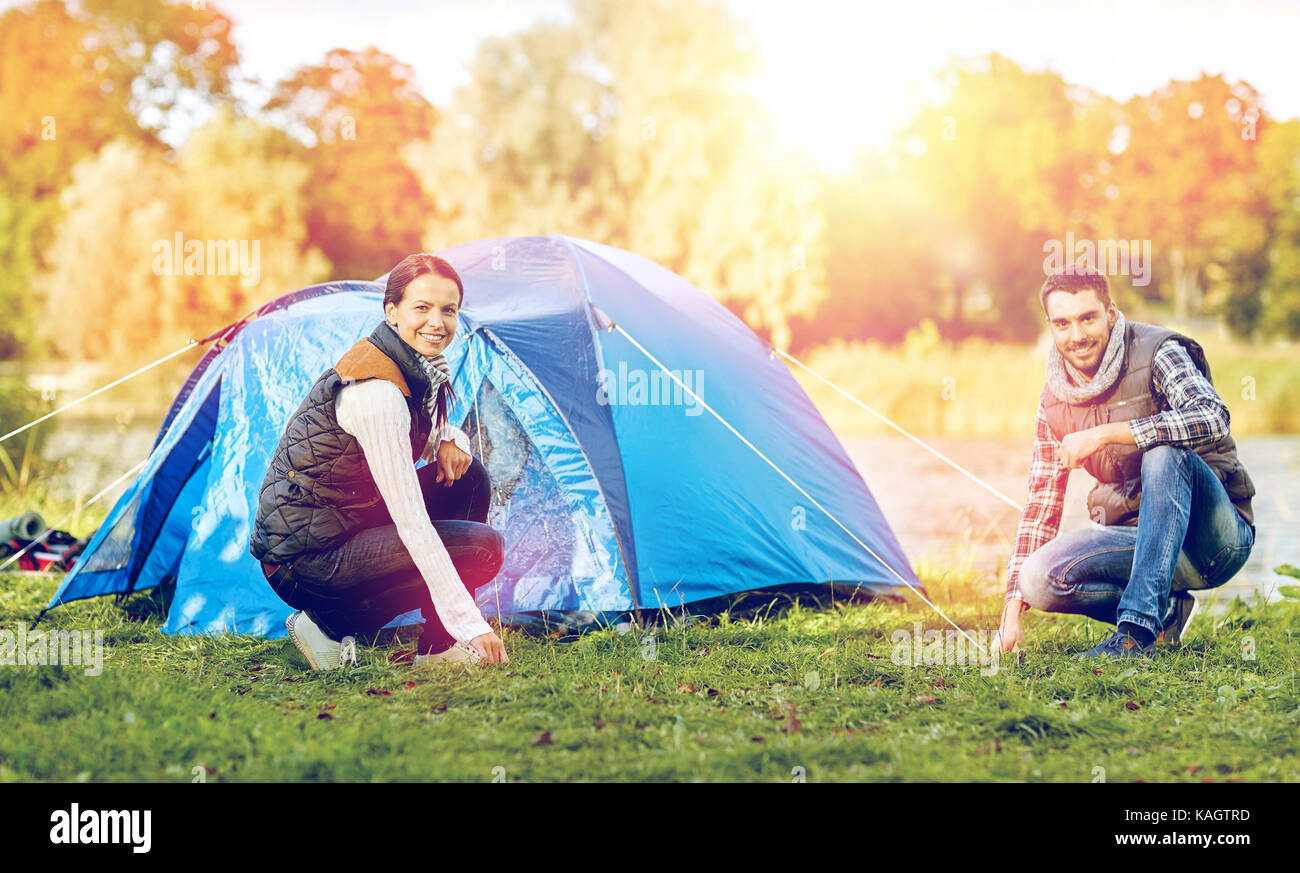 Setting up tent hi-res stock photography and images - Alamy