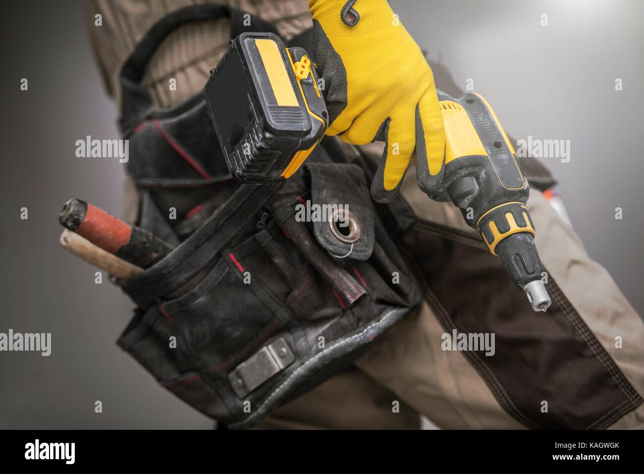 Contractor with Power Tool. Construction Worker with Drill Driver Pro ...