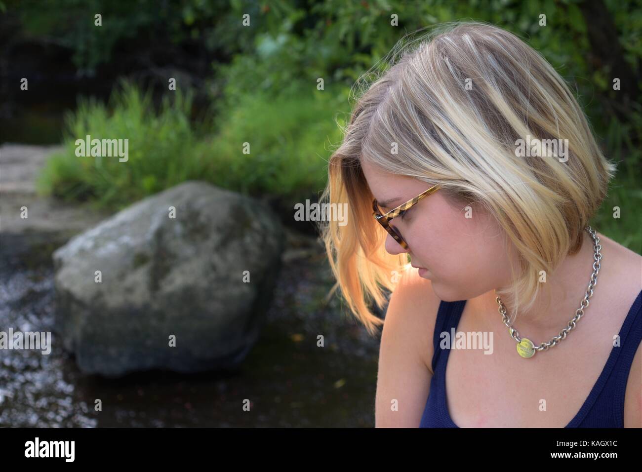 Portrait by river Stock Photo - Alamy