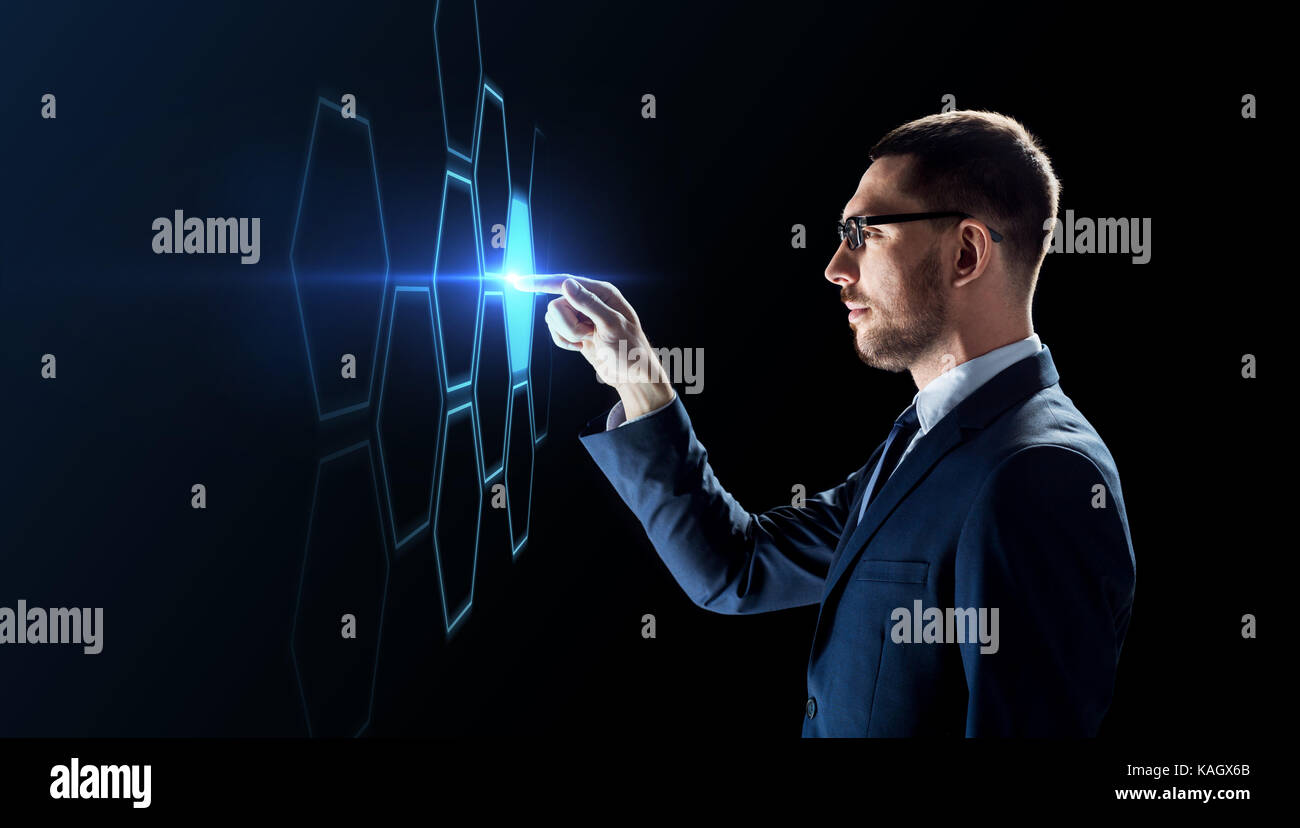Business man showing virtual screen hi-res stock photography and images ...