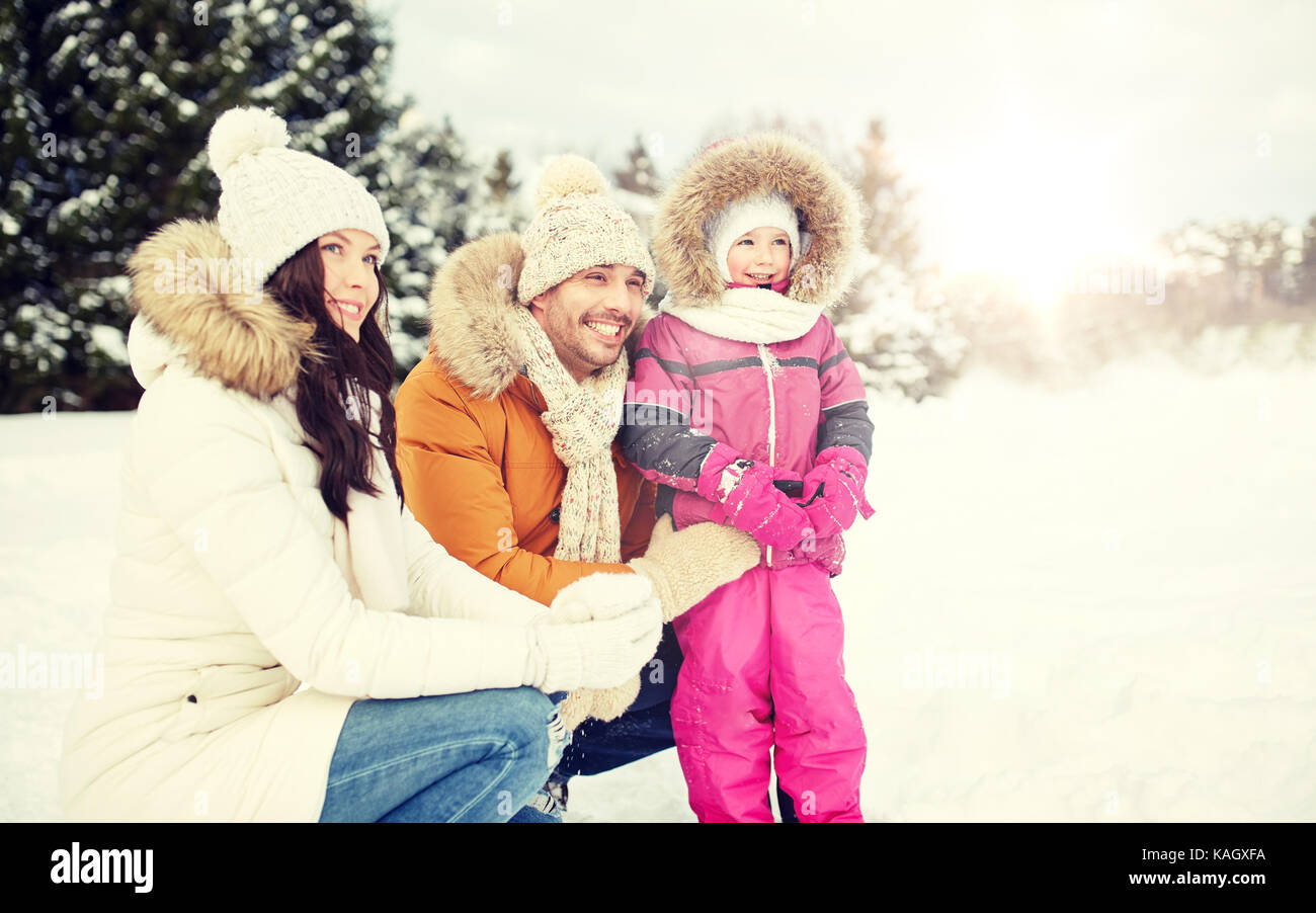 happy family with child in winter clothes outdoors Stock Photo - Alamy