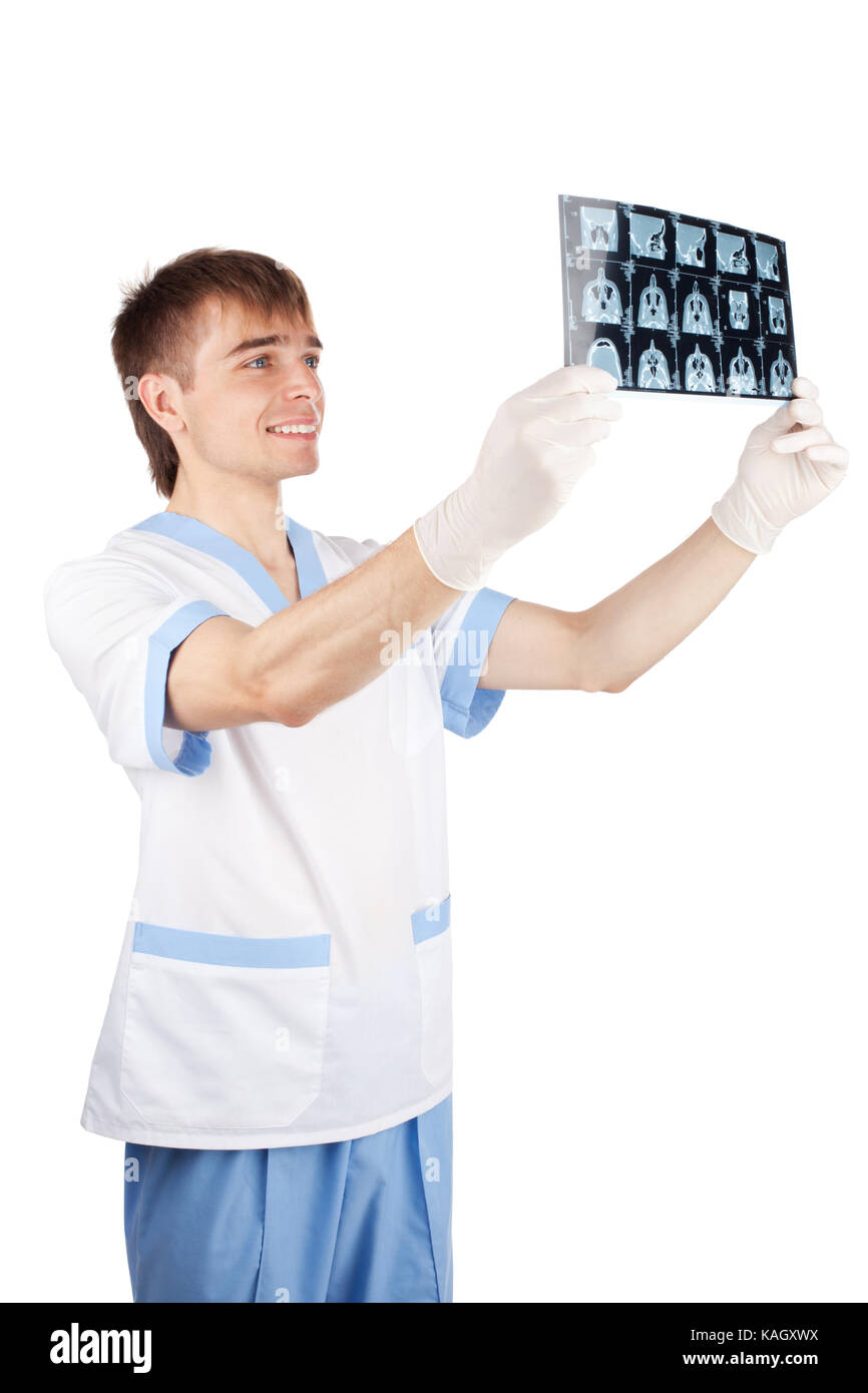 smiling medical doctor looking at CT computer tomography scan image ...