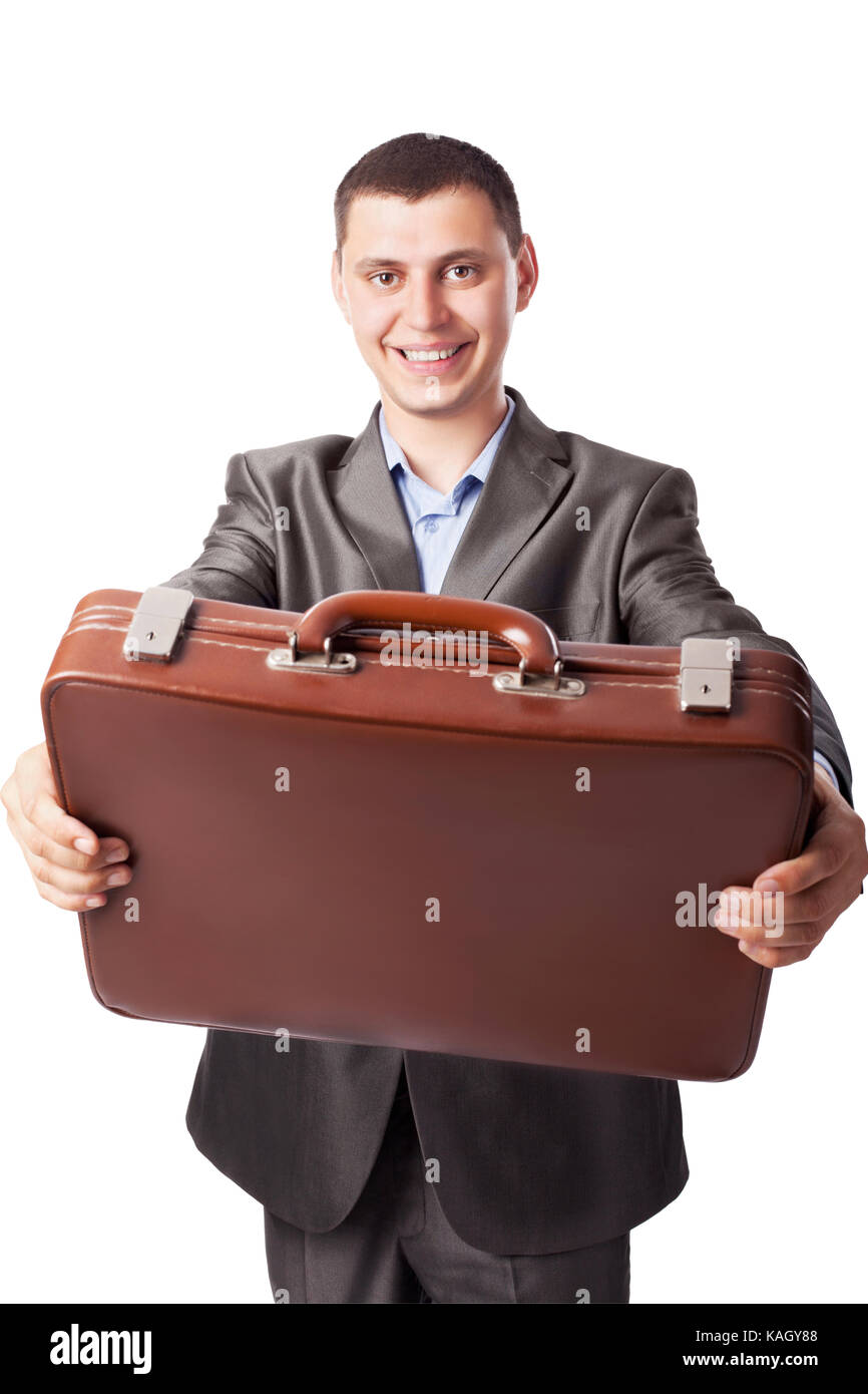 young businessman holds a brief case isolated on white background Stock ...