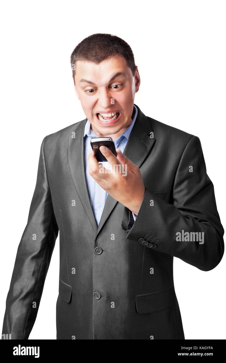 An angry businessman screaming in cell mobile phone isolated on white ...