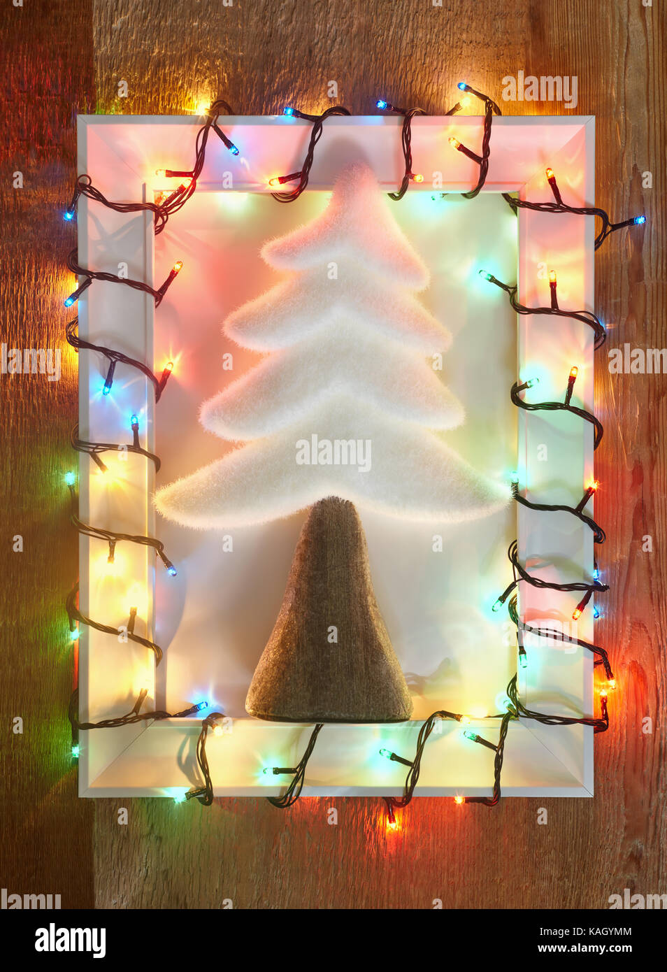 Decorative fir tree in christmas lights frame Stock Photo - Alamy