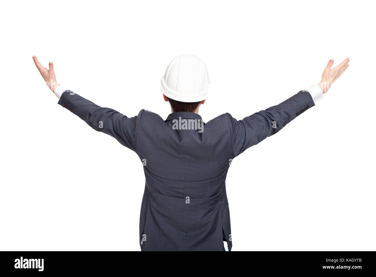 Engineer standing back view holding his arms up isolated on white ...