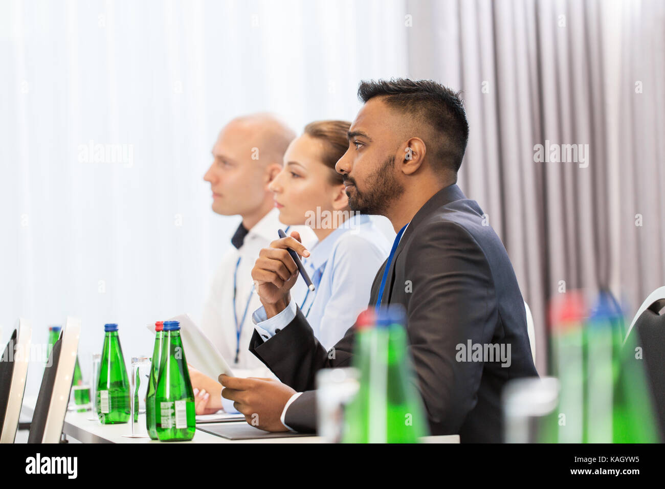 business team at international conference Stock Photo - Alamy