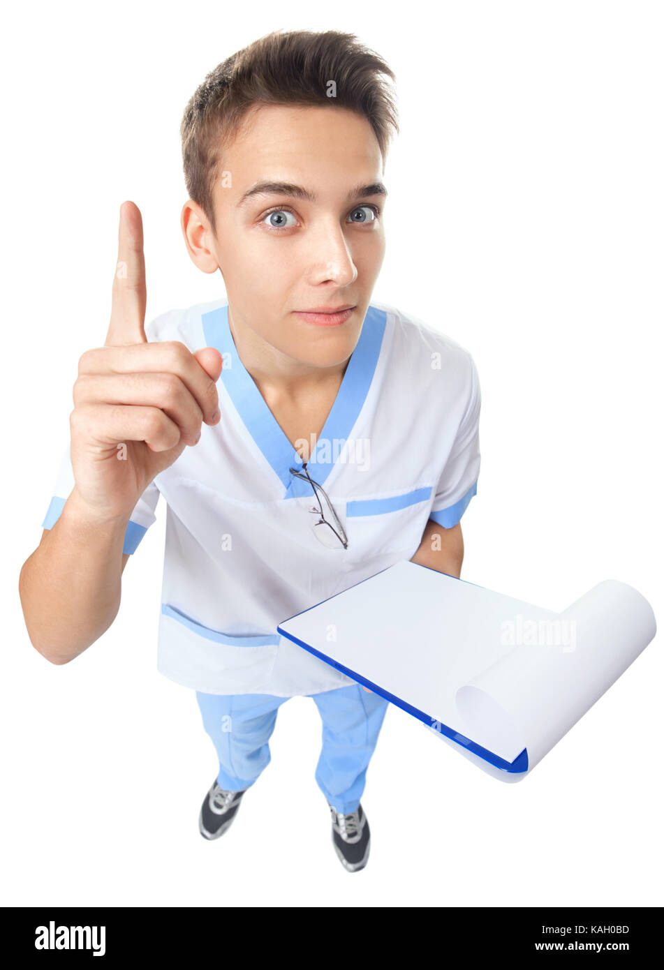 Wide angle top view of young doctor with clipboard pointing a good idea ...