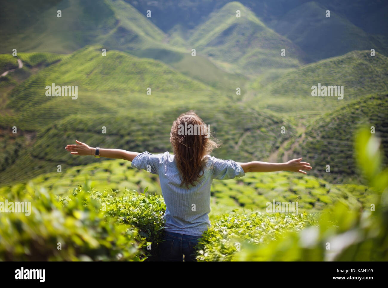 freedom girl in mountains Stock Photo - Alamy