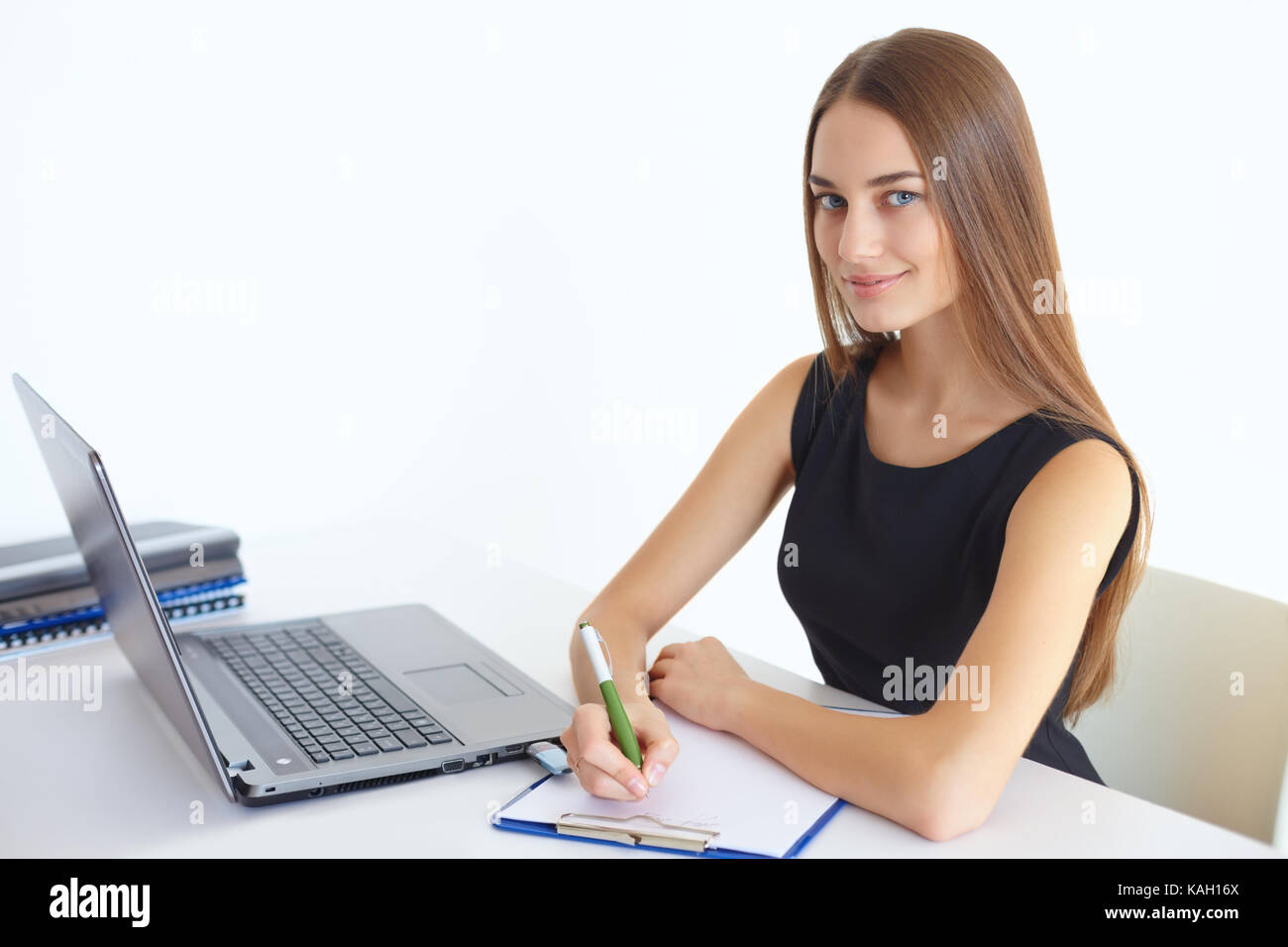 Beautiful office girl taking notes hi-res stock photography and images ...