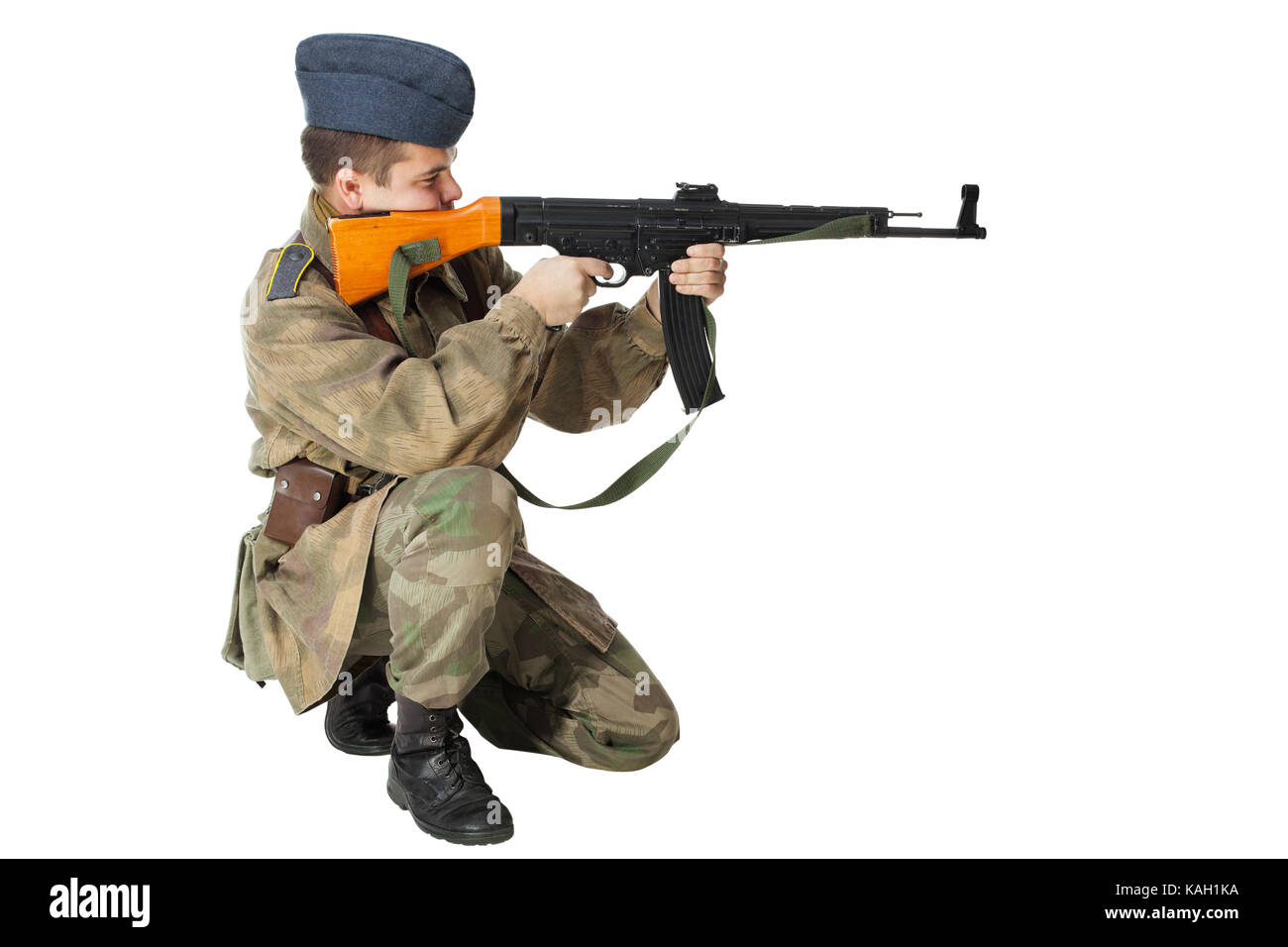 Soldier with submachine gun, second world war style. Isolated on white ...