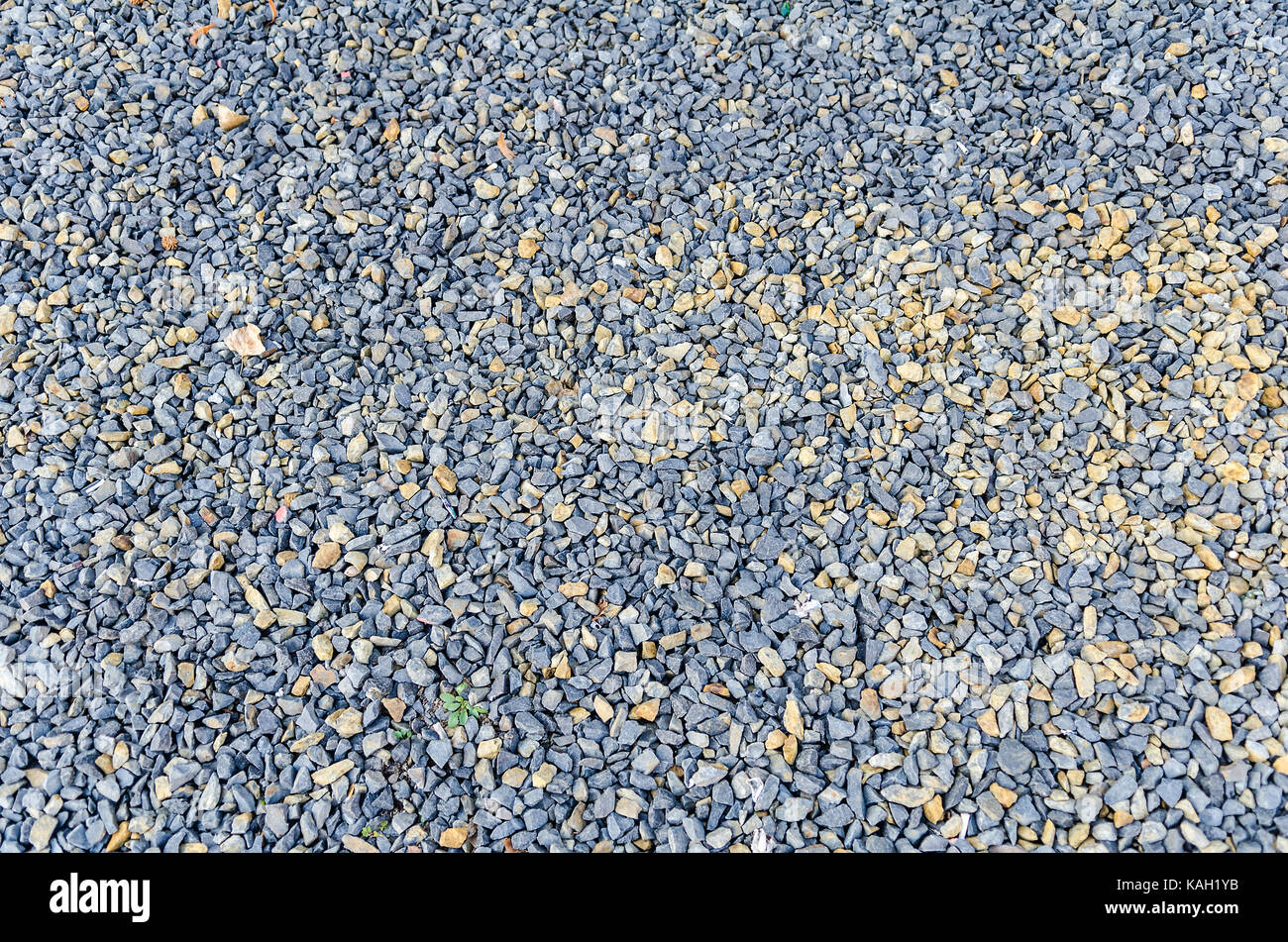 grey blue yellow gravel texture, loose gravel layer Stock Photo - Alamy