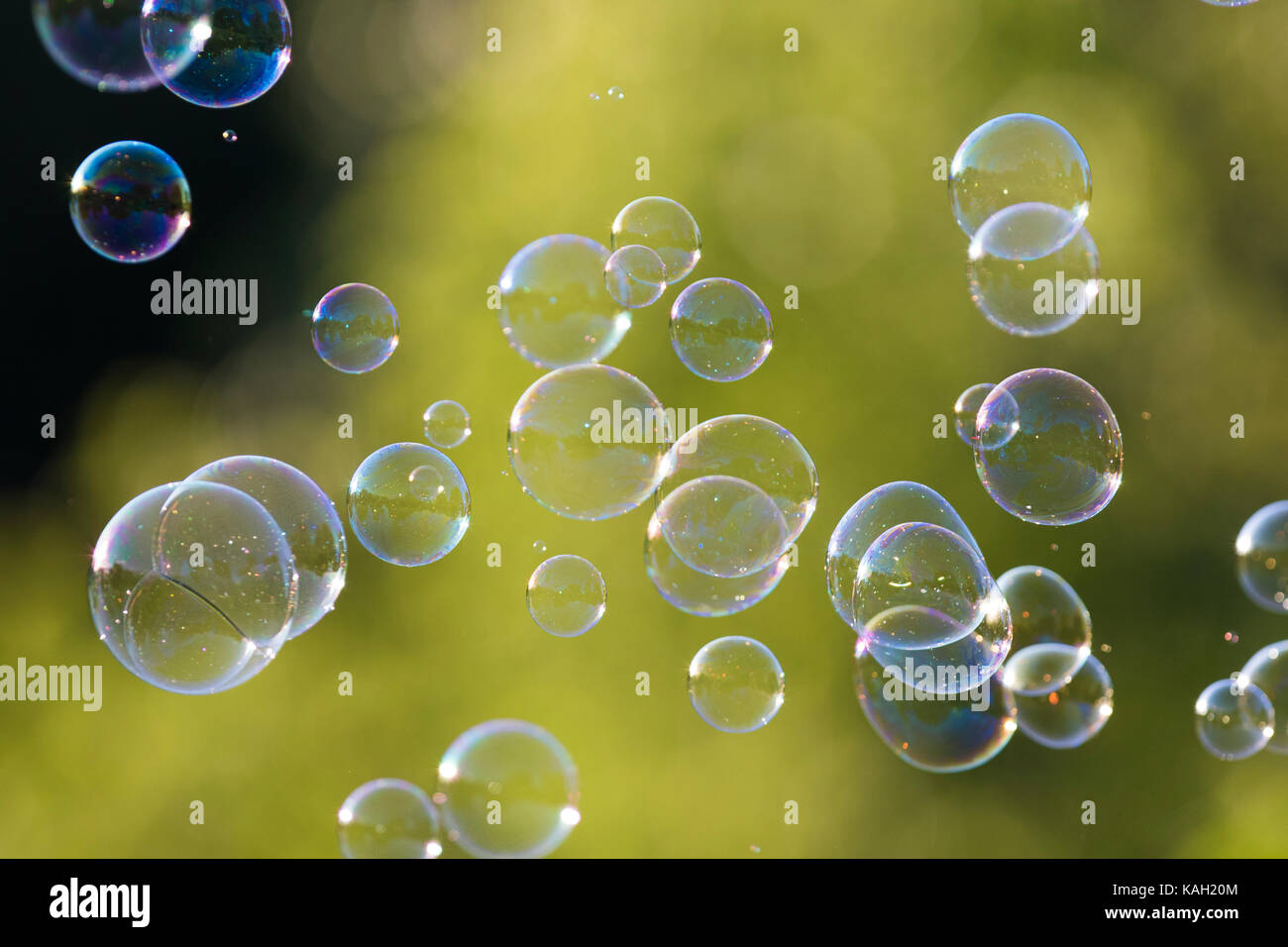 Beautiful blowing soap bubbles hi-res stock photography and images - Alamy