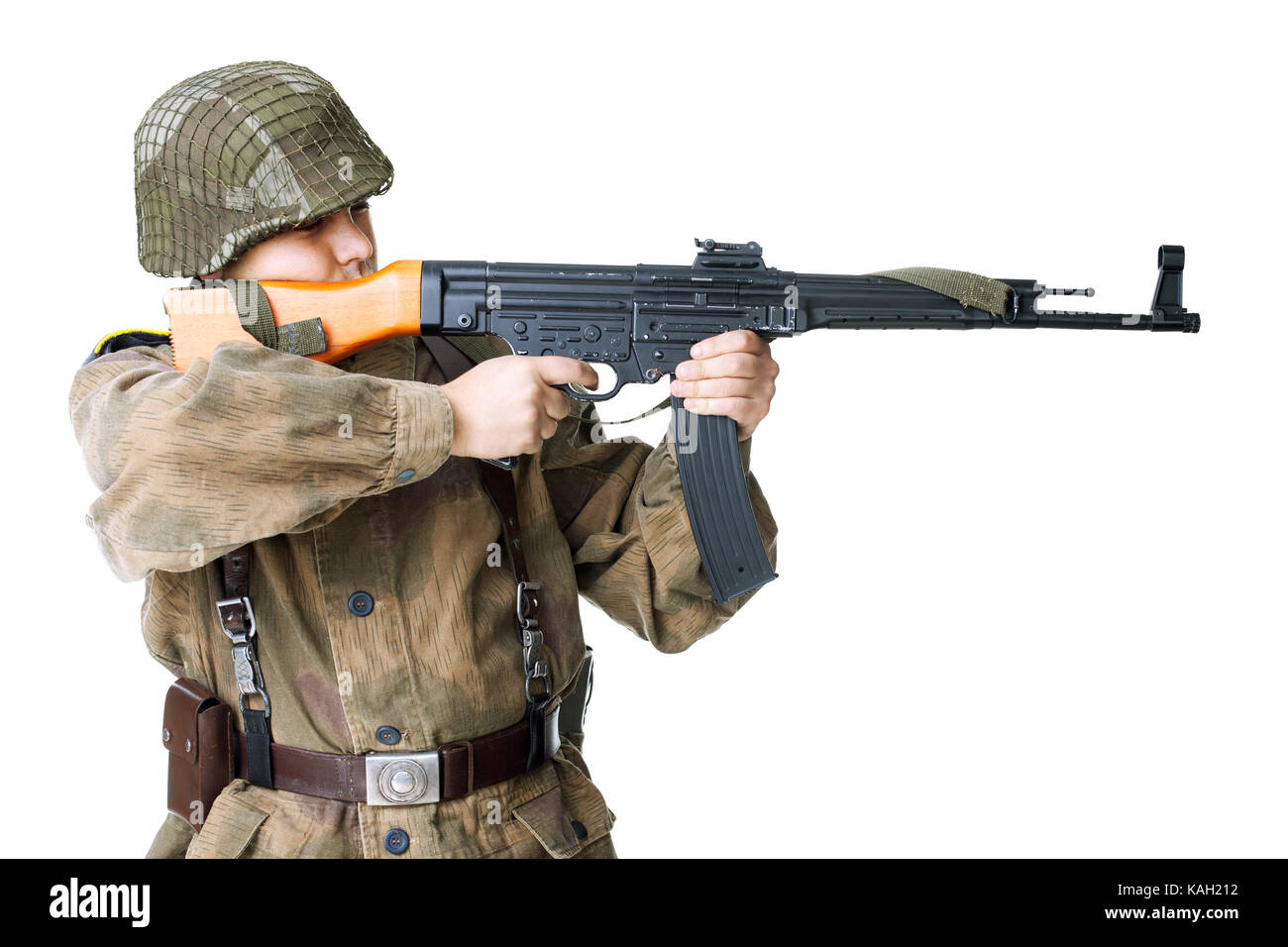 Soldier shoots submachine gun isolated on white background Stock Photo ...