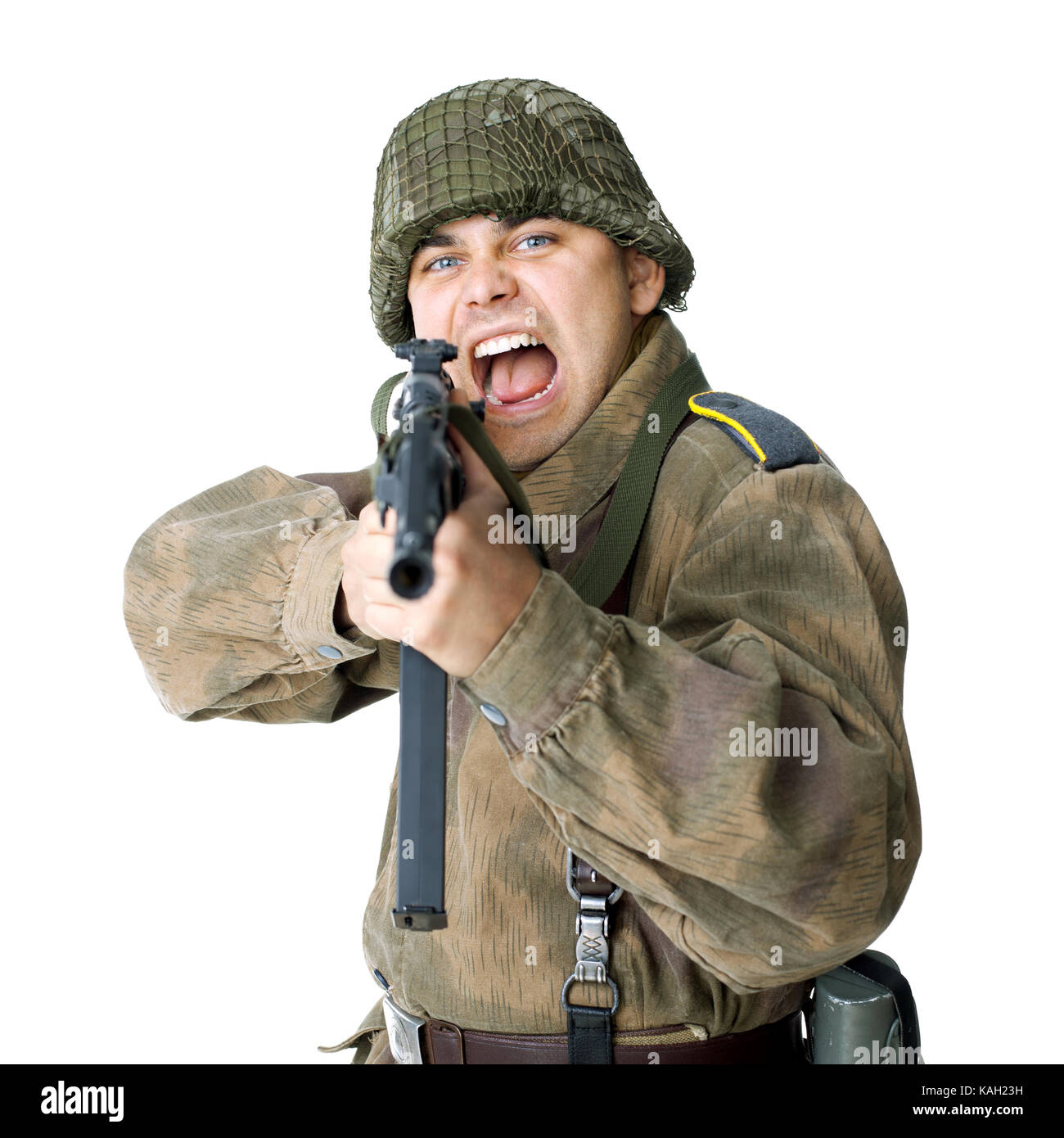 Soldier shoots submachine gun isolated on white background Stock Photo ...