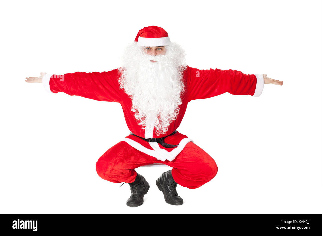 Dancing Santa Claus isolated on white background Stock Photo - Alamy