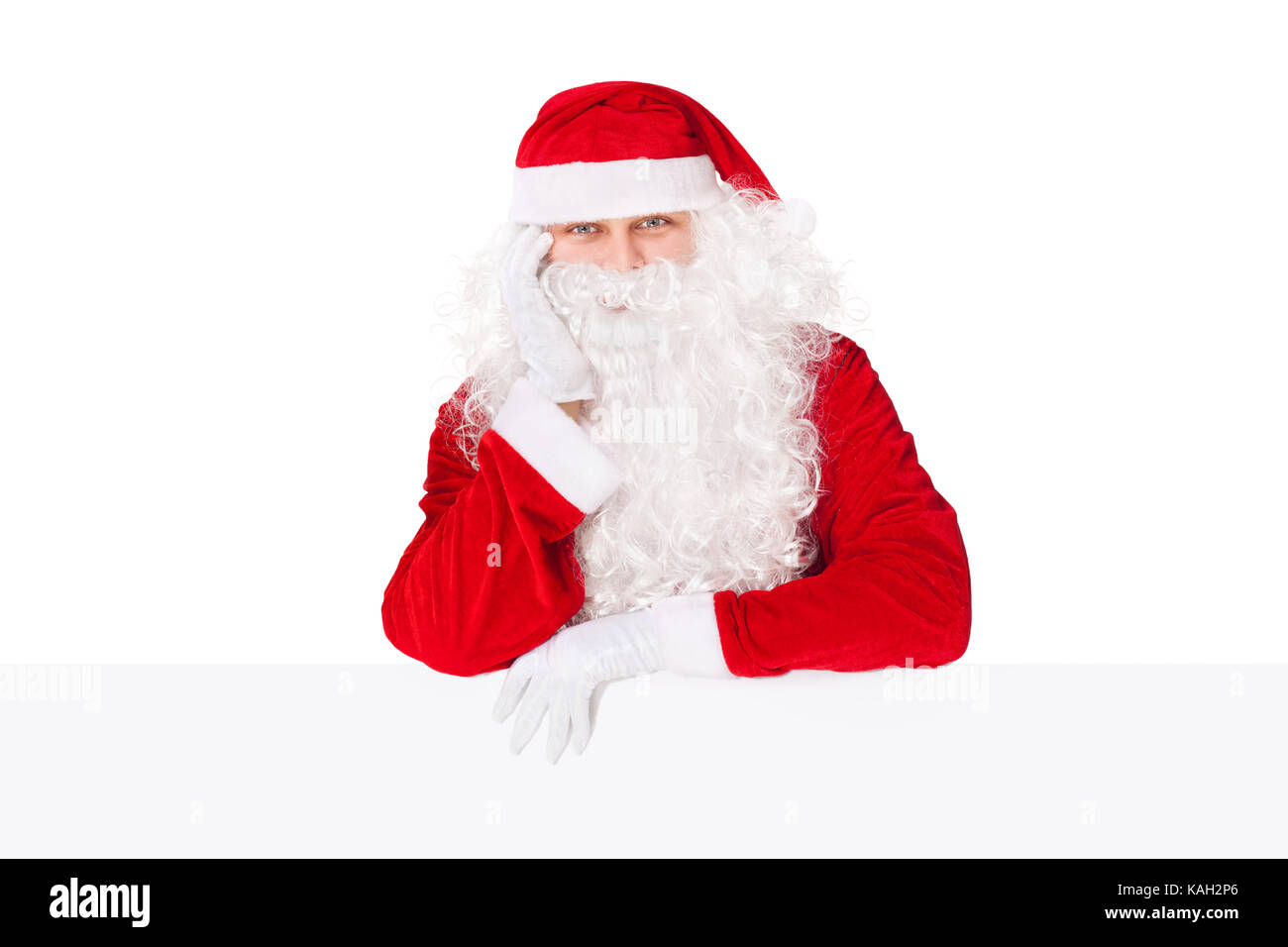 Santa Claus leaning on blank board isolated on white background Stock ...