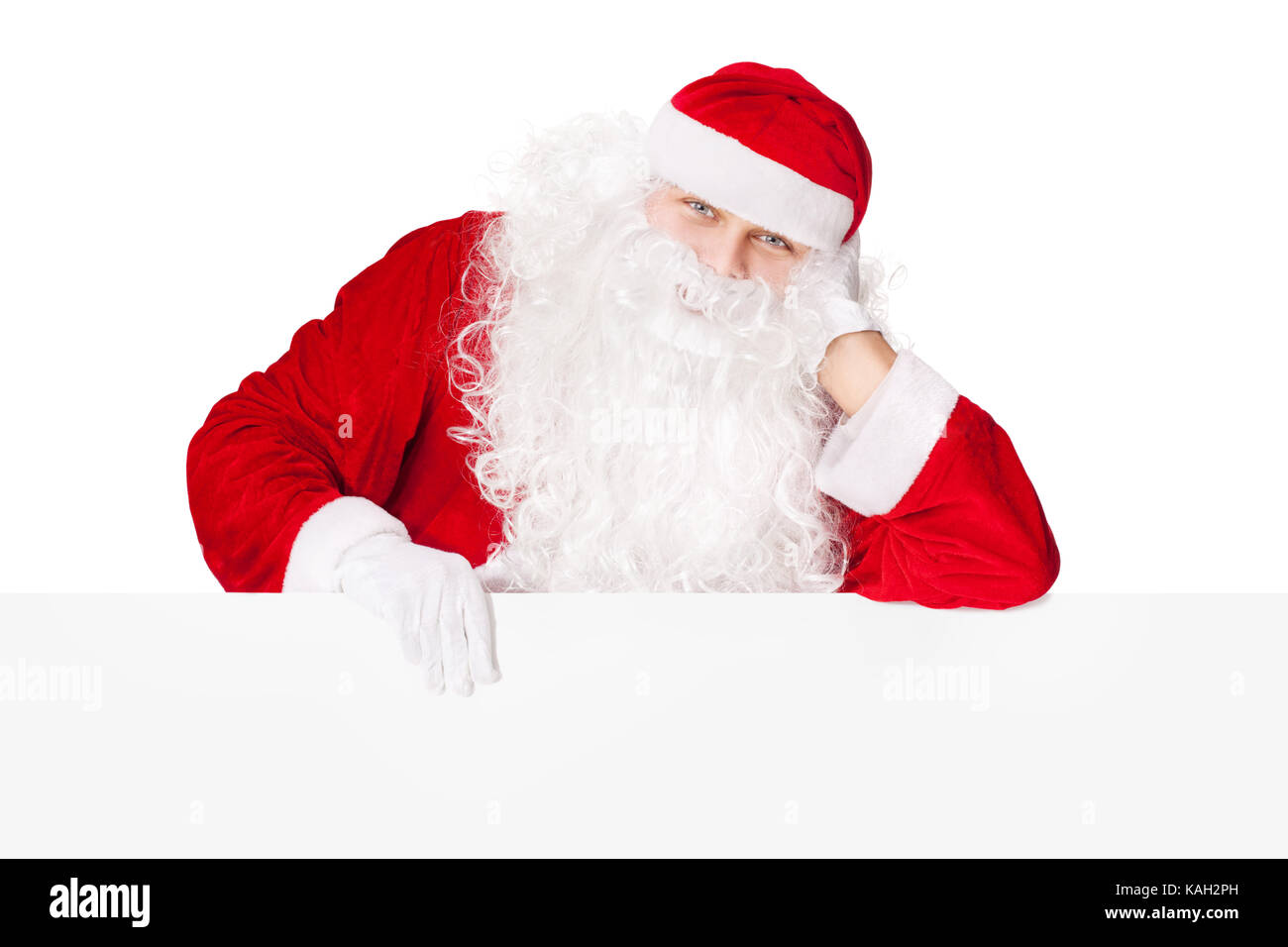 Santa Claus leaning on blank board isolated on white background Stock ...
