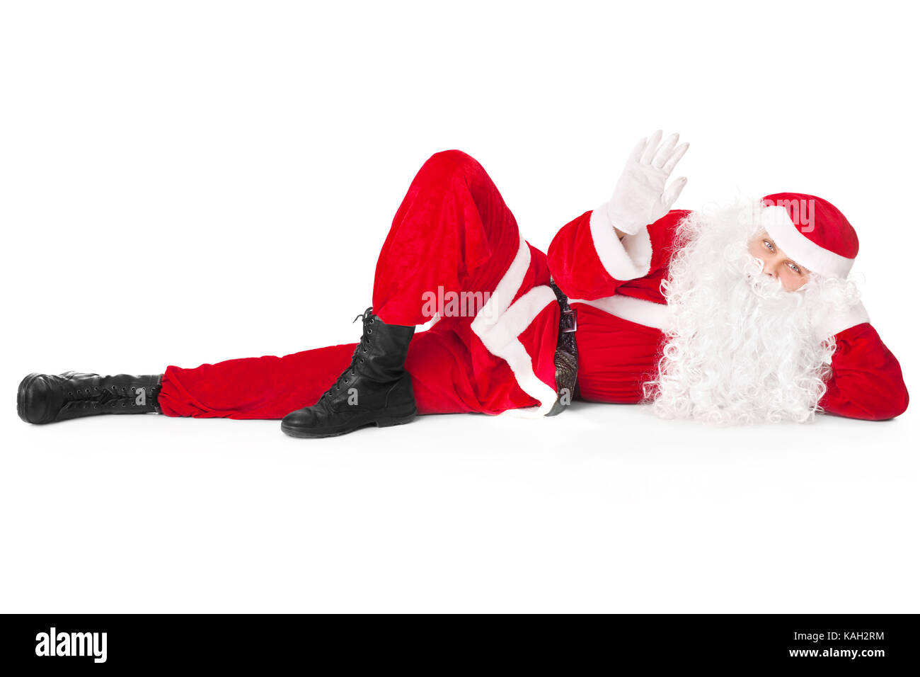 Santa Claus lying isolated on white background Stock Photo - Alamy