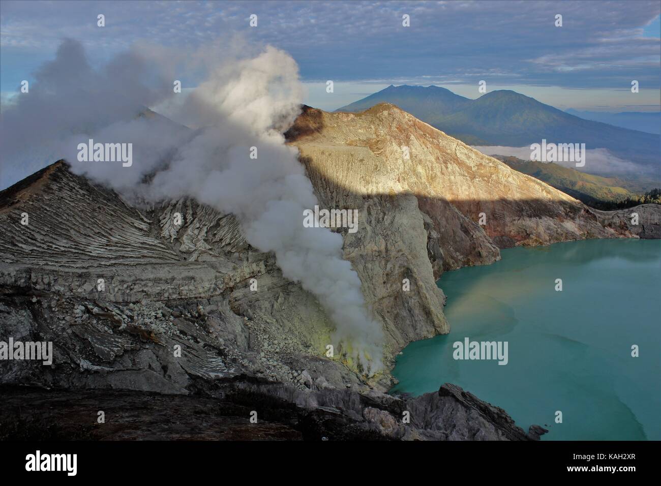 Ijen volcano with sulphur clouds coming from sulphur mine, Java ...