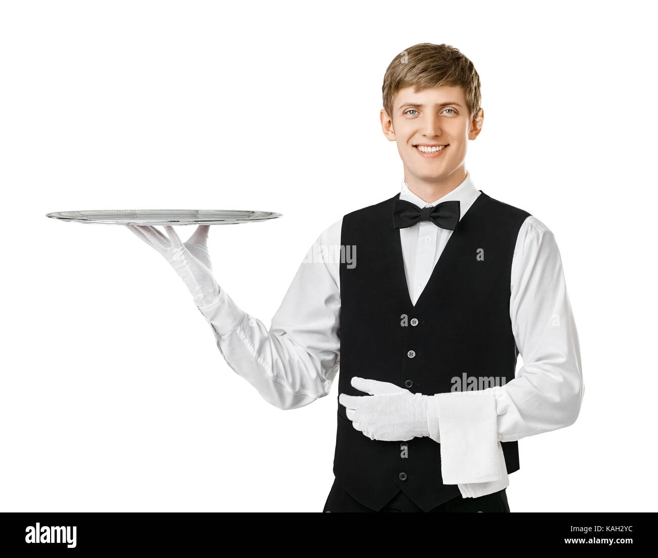 Portrait of young handsome waiter holding empty tray isolated on white ...