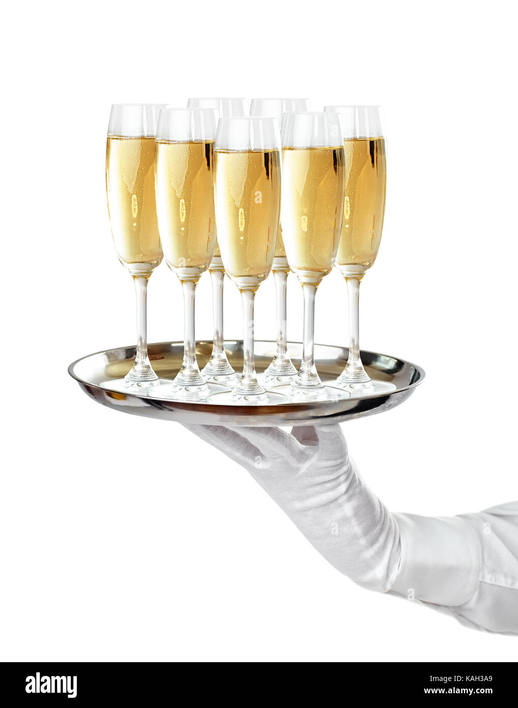 Elegant waiter serving champagne on a tray Stock Photo - Alamy