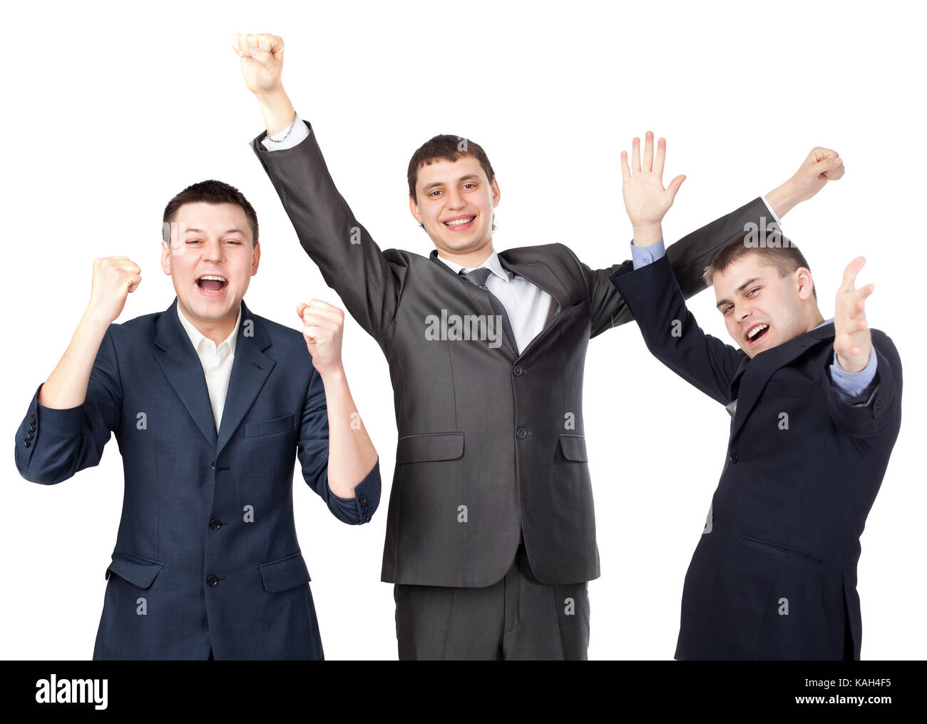 Successful young businesspeople raising hands isolated on white ...