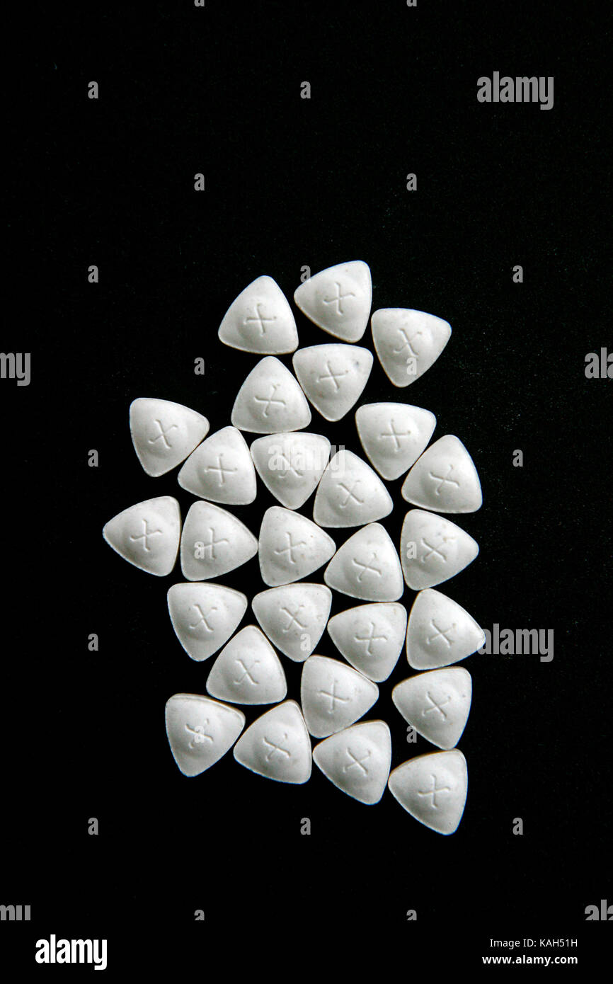 Taking ecstasy tablets hi-res stock photography and images - Alamy