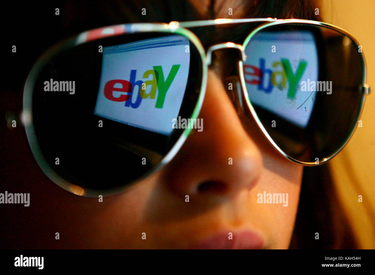 Online auction website eBay reflected in sunglasses Stock Photo - Alamy
