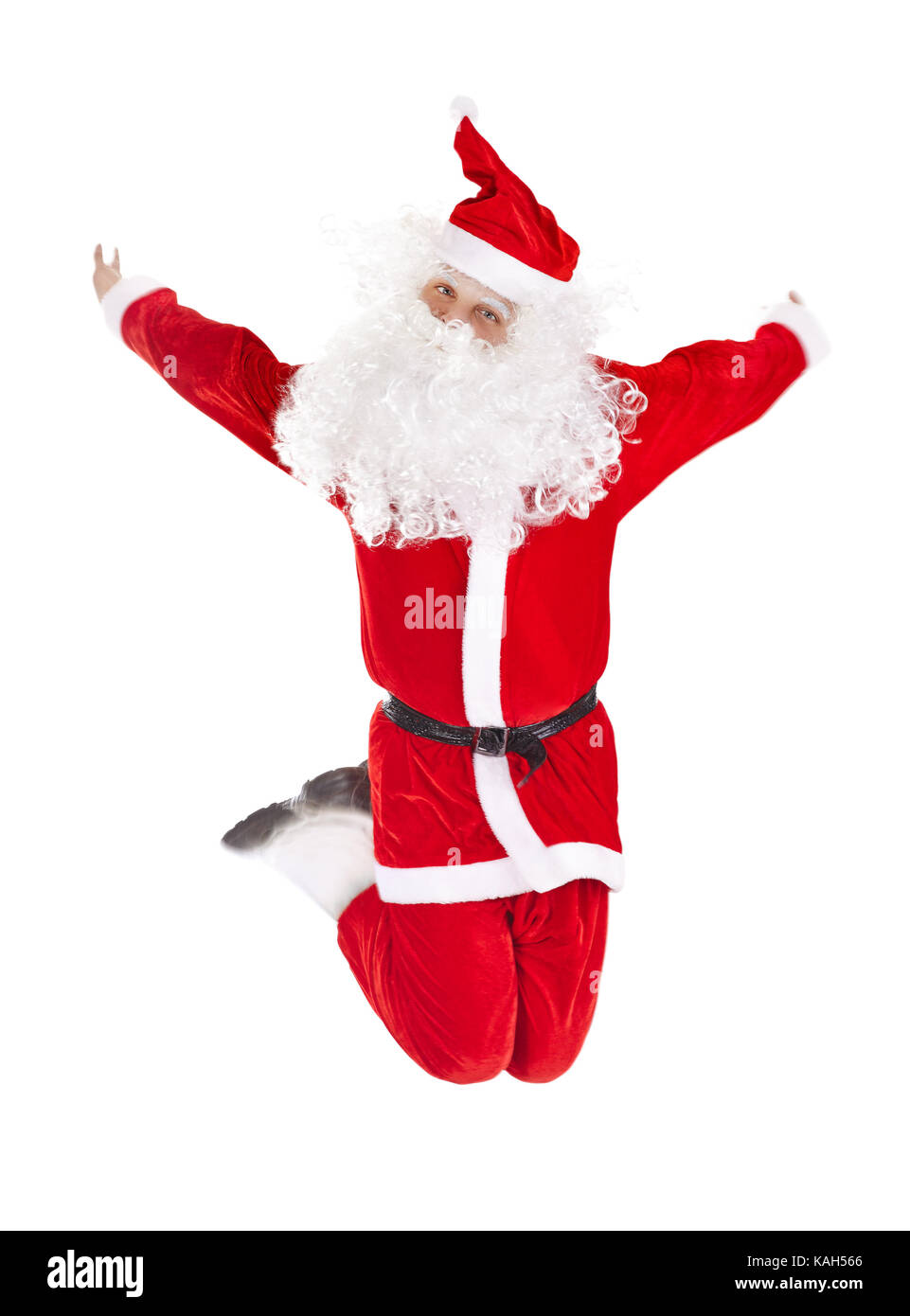 Santa Claus jumping, isolated on white background Stock Photo - Alamy