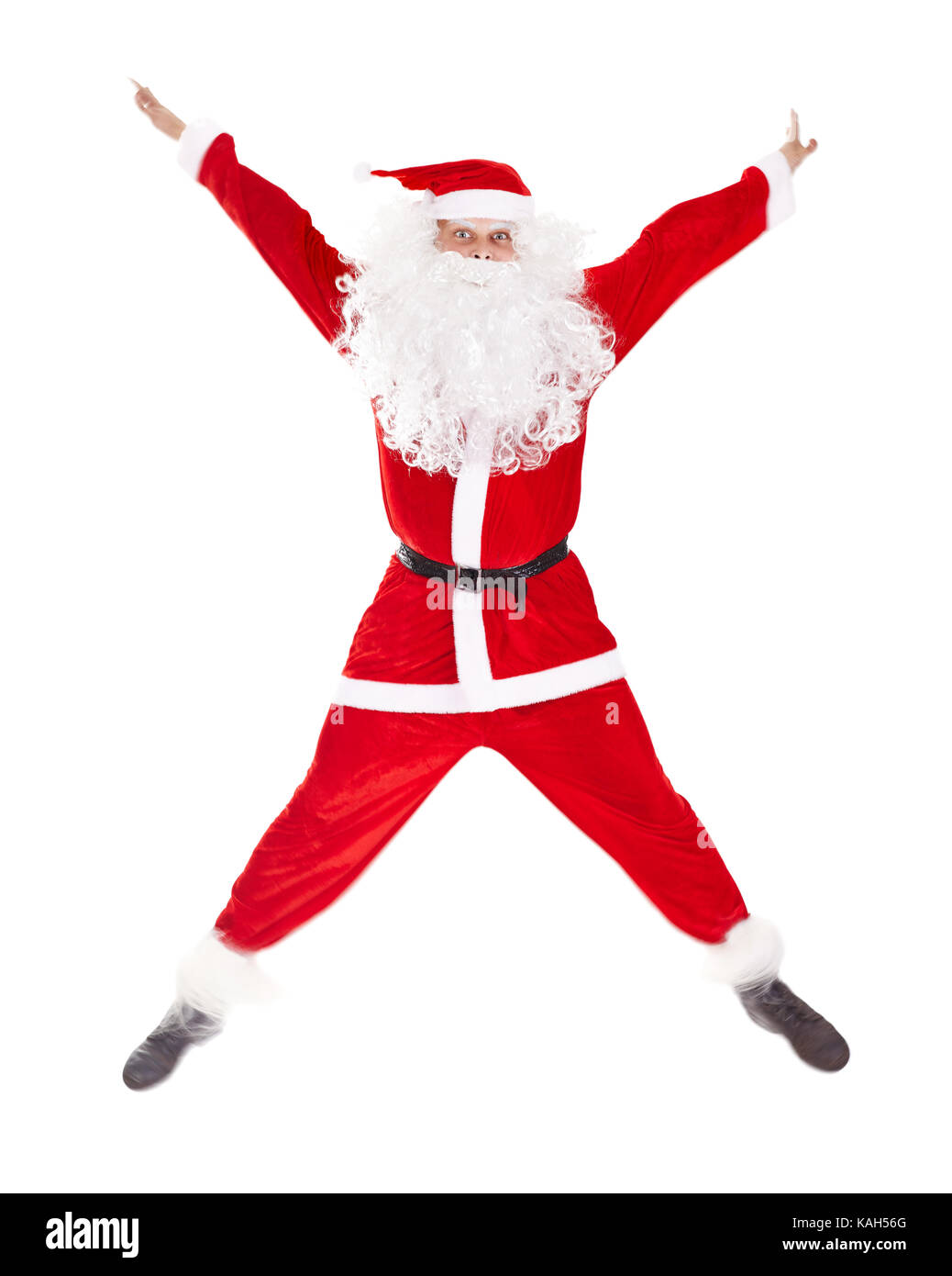 Santa Claus jumping with hands lifted upwards isolated on white ...