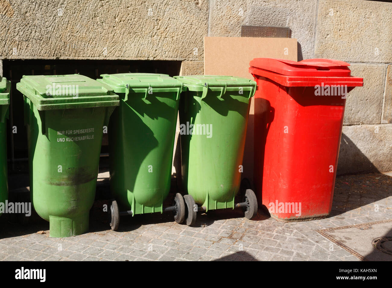 green and red recycling bins Stock Photo - Alamy