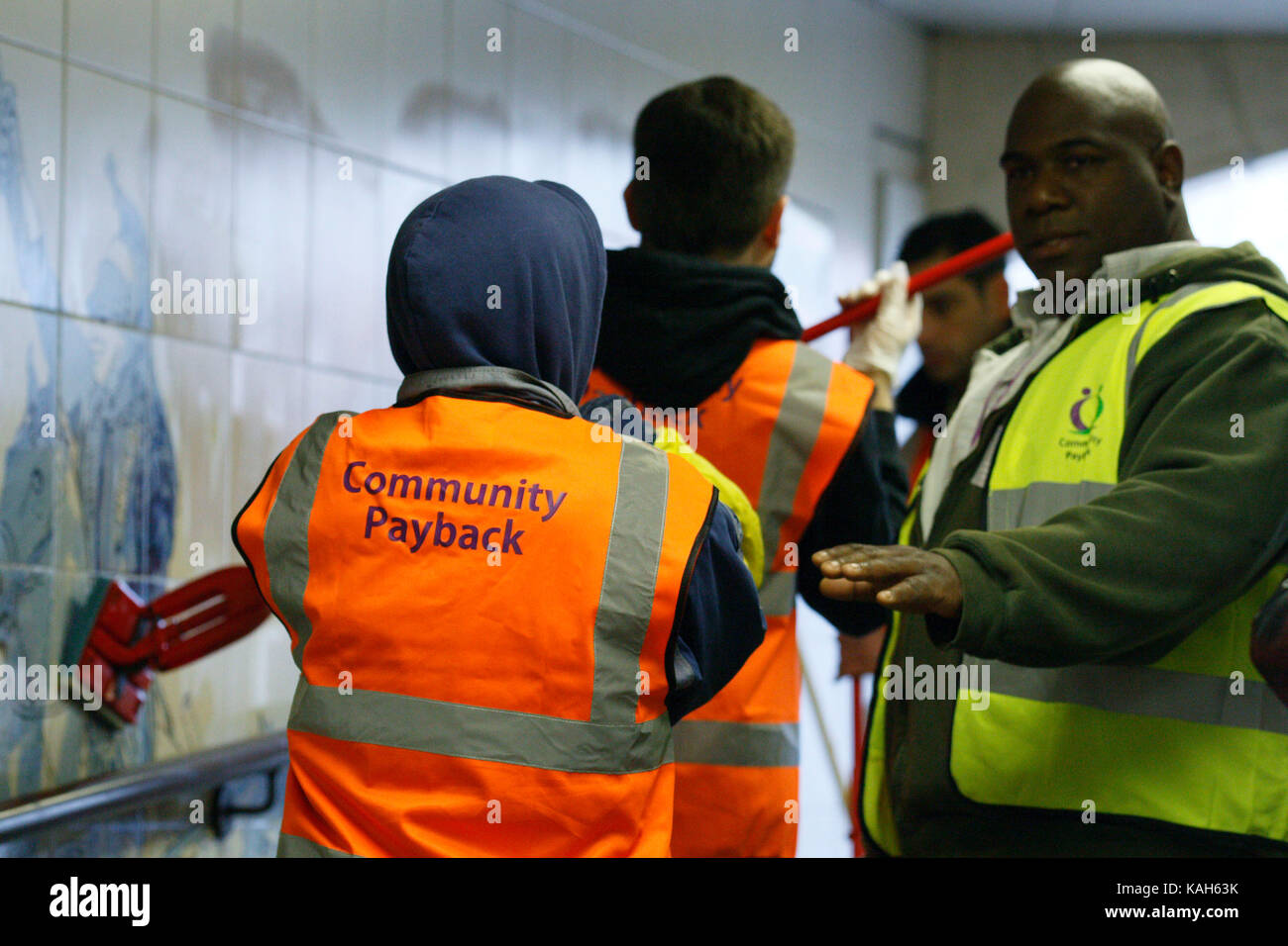 Offenders cleaning the tunnel walls of Hyde Park Corner tube as part of ...
