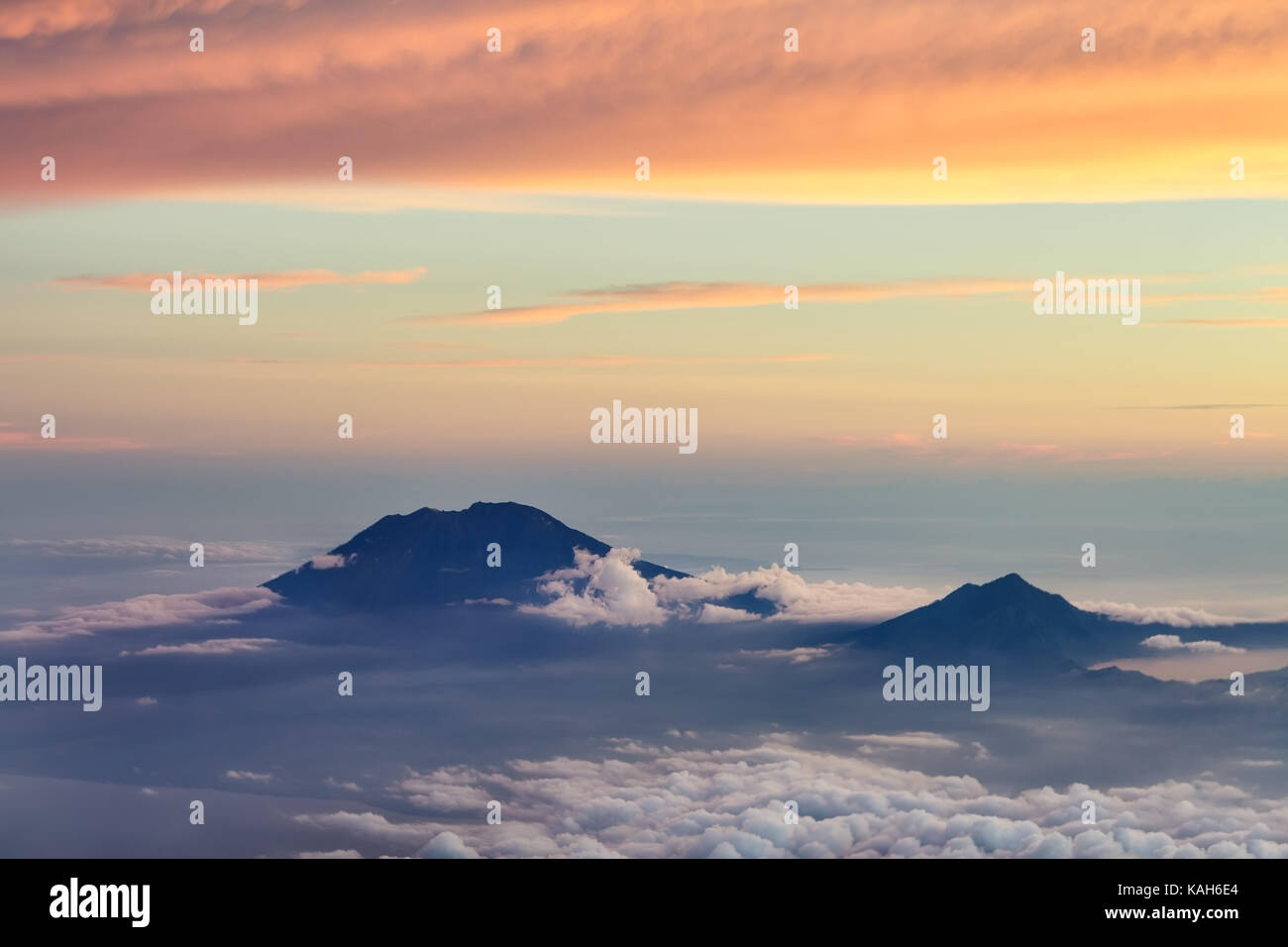 Sunset over the clouds. beautiful background with clouds and mountain ...