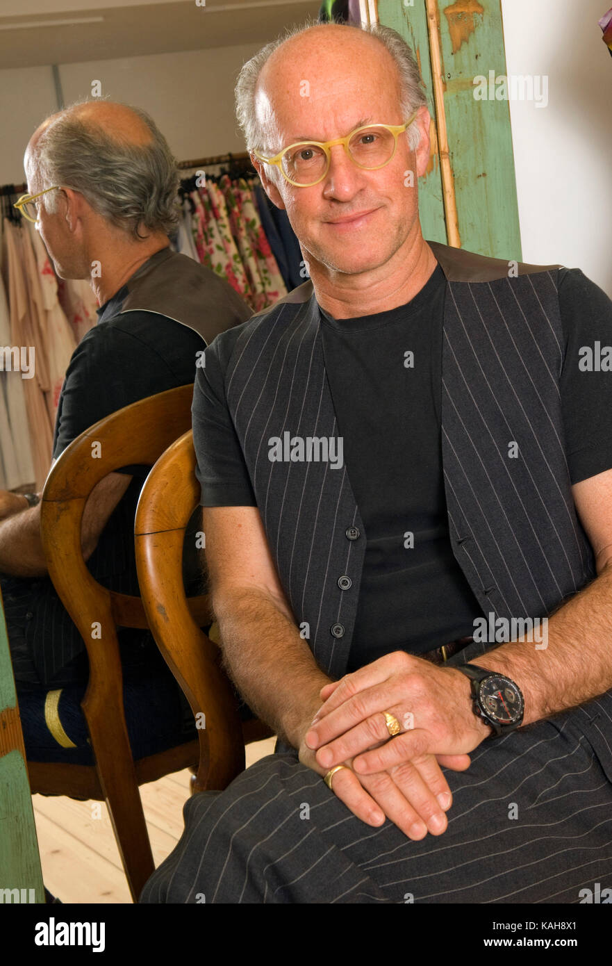 Roger Saul (holding his first Mulberry creation, a briefcase), founder ...