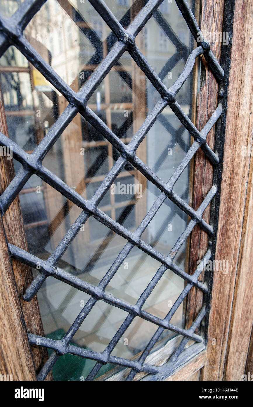 old metal lattice window in the wall Stock Photo - Alamy