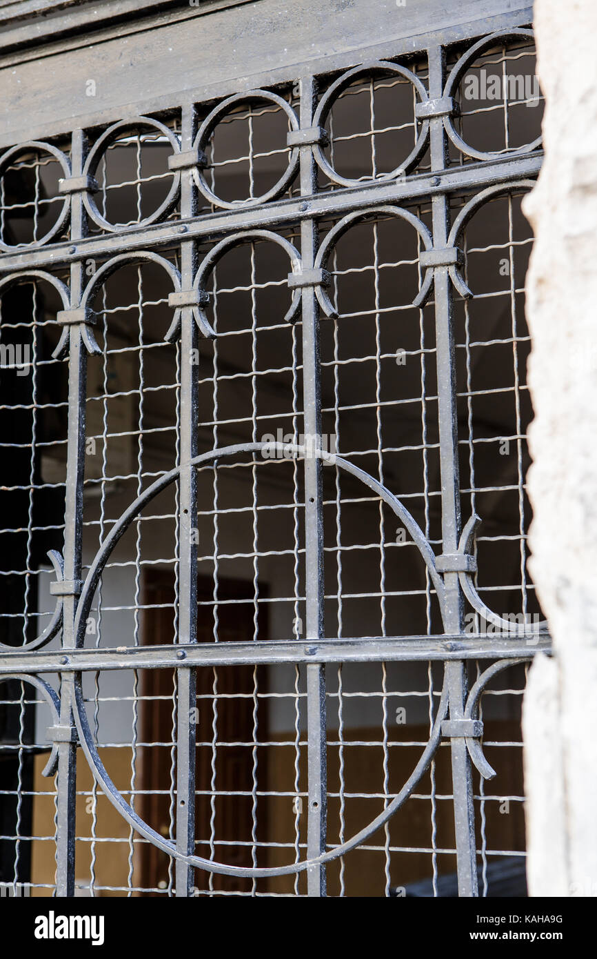 old metal lattice window in the wall Stock Photo - Alamy
