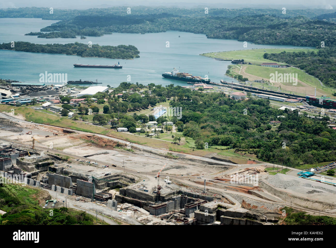 Aerial view of cargo ships at Gatun Locks and the new larger set of ...