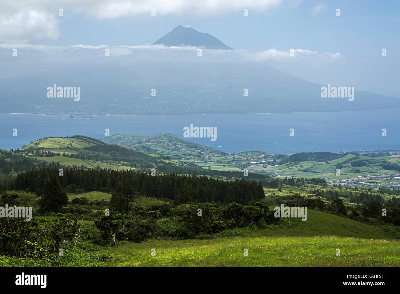 View from the island Faial to the island Pico with volcanic cone of the ...