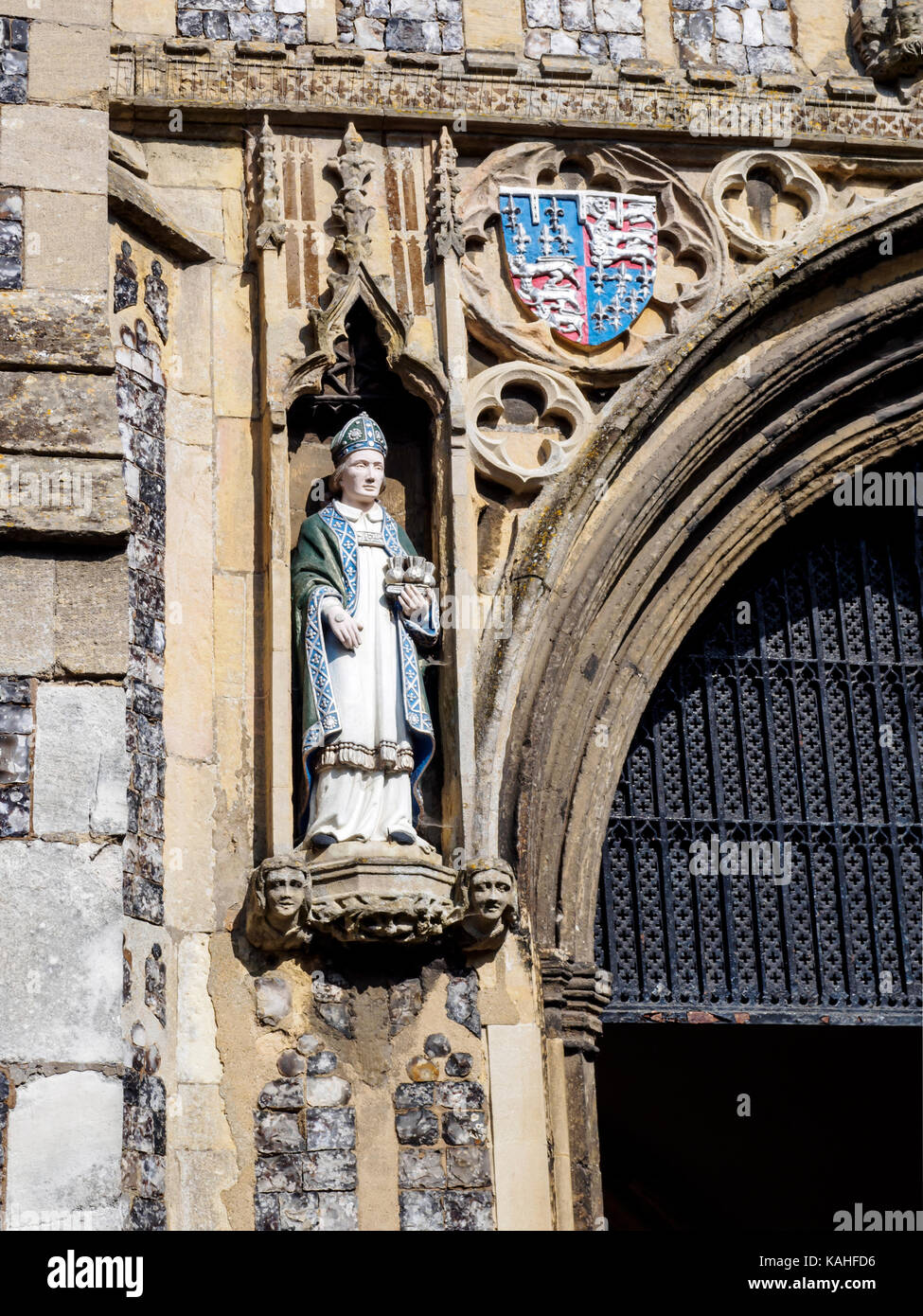 The ornate decorated porch of St Nicholas Church in the market town of ...