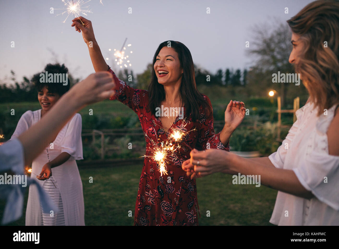 Group of friends enjoying party hi-res stock photography and images - Alamy