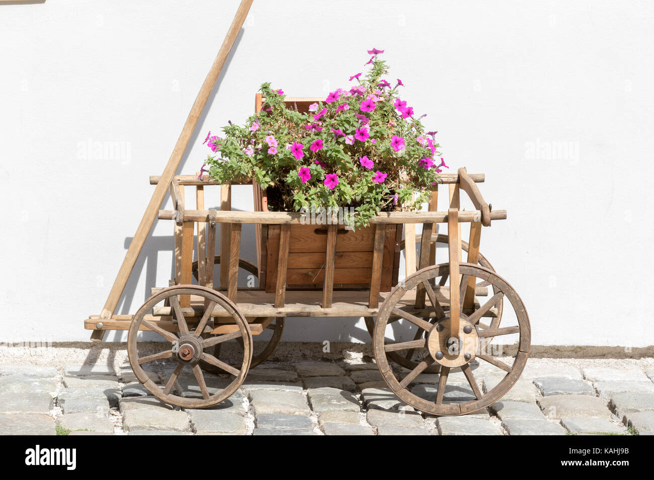 Old wooden wagon flowers decorative hi-res stock photography and images ...