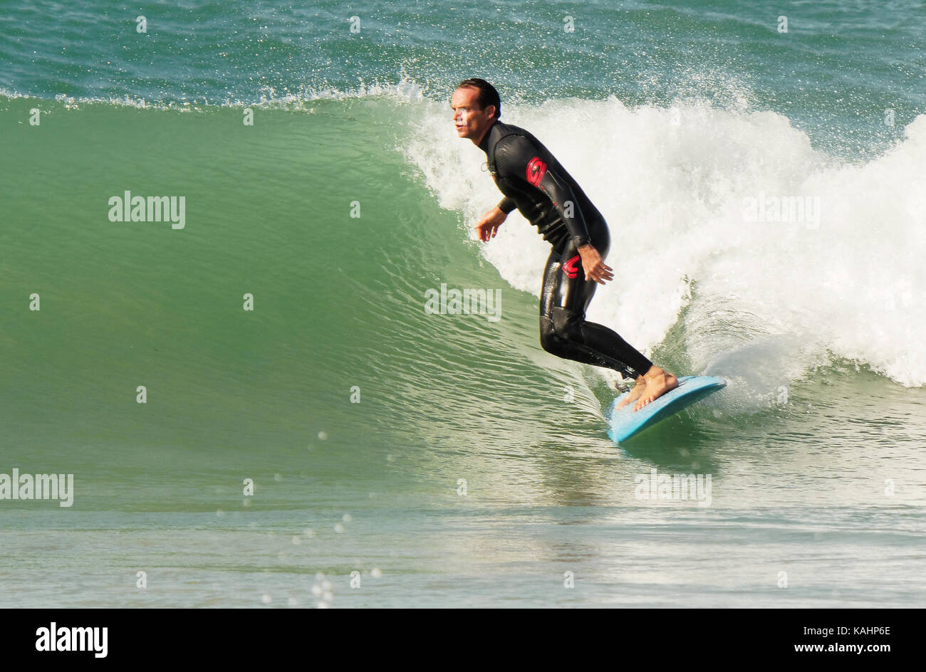 English surfing young men on sunny day Stock Photo - Alamy
