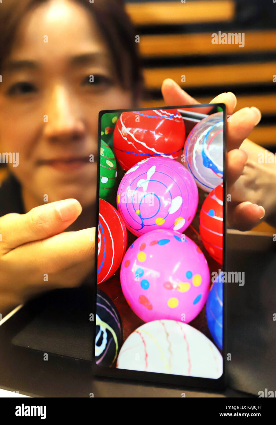 Tokyo, Japan. 26th Sep, 2017. An employee of Japan Display Inc. (JDI ...