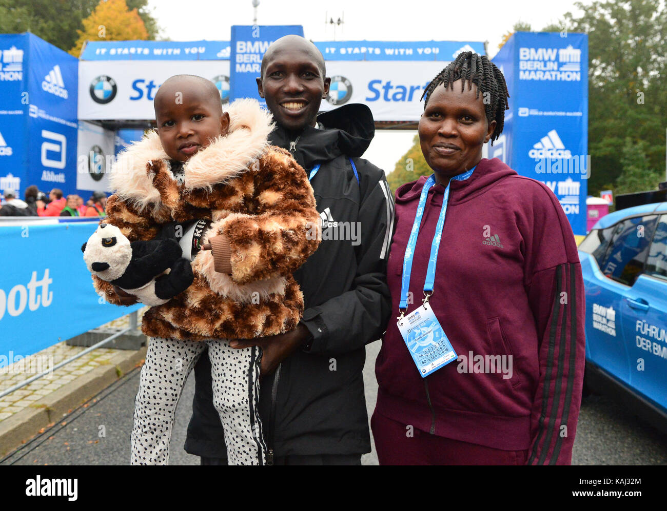 Berlin, Germany. 24th Sep, 2017. Felix Kandie (KEN) poses with wife and ...