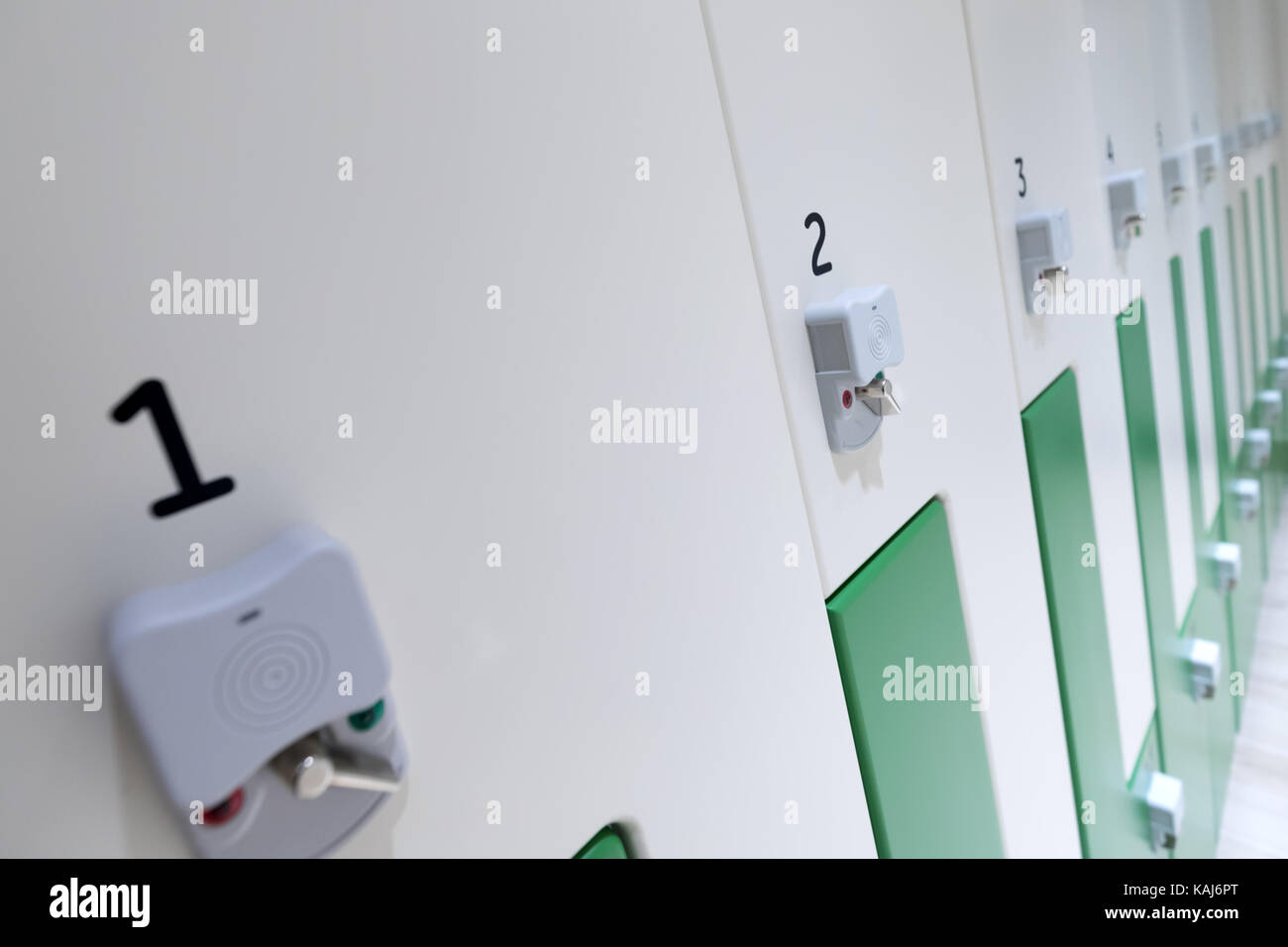 Locker room with security compartments Stock Photo - Alamy