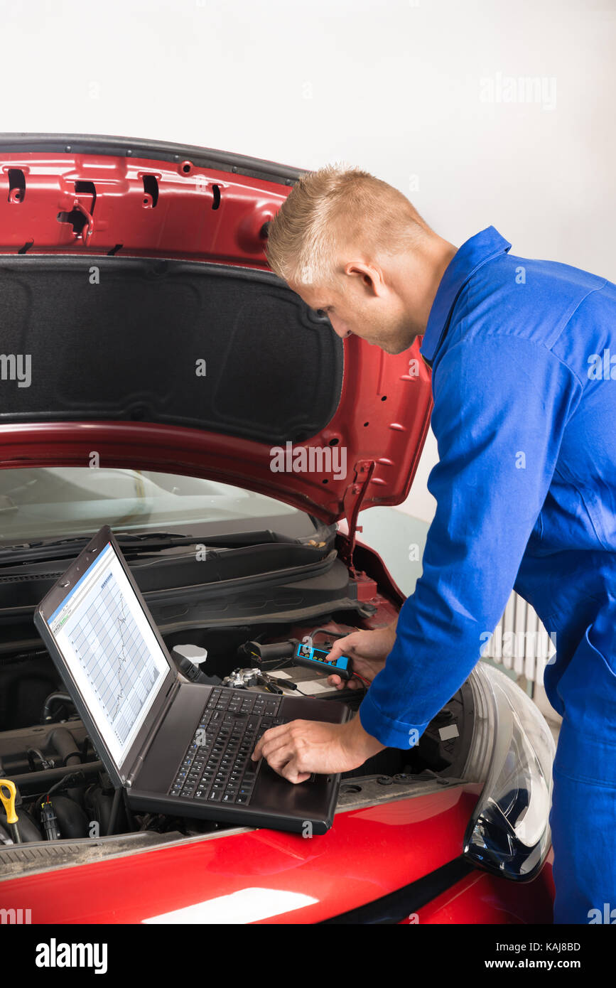 Man repairing laptop computer in hi-res stock photography and images ...